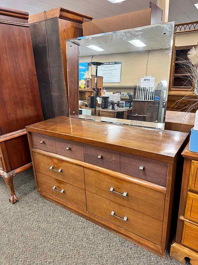 That mid-century dresser with the original mirror is exactly what your bedroom has been missing all these years.