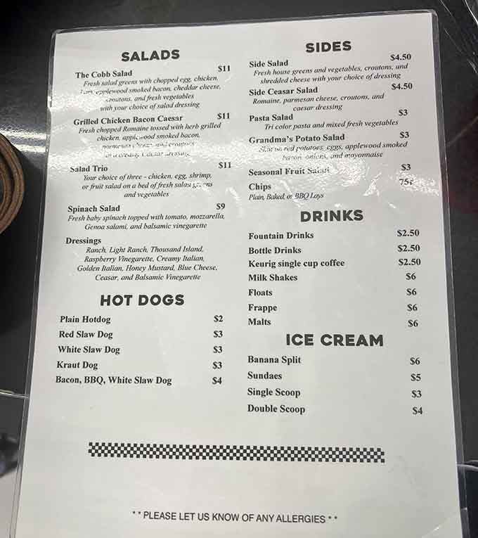 The menu keeps things refreshingly straightforward: good food, cold drinks, sweet treats, and zero pretension required.