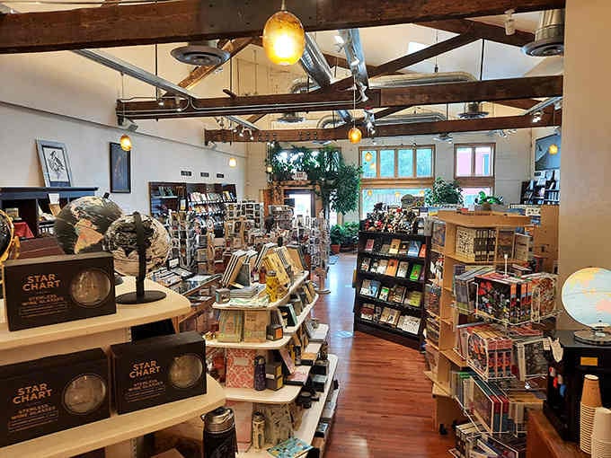 Those exposed beams and warm lighting create the kind of atmosphere where time slows down and books matter again.