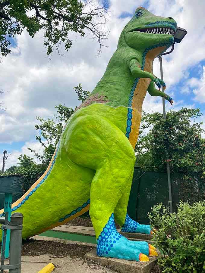 This towering dinosaur statue looks ready to photobomb your family pictures at any moment.