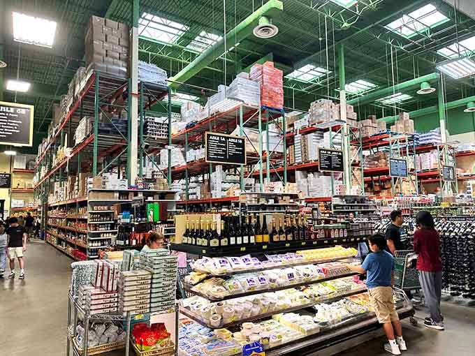 Warehouse-style shelving reaches skyward, stocked with treasures that would make Indiana Jones trade his whip for a shopping cart.