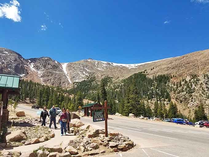 The Summit House welcomes visitors who've conquered the climb, offering warmth and sustenance at 14,000 feet.