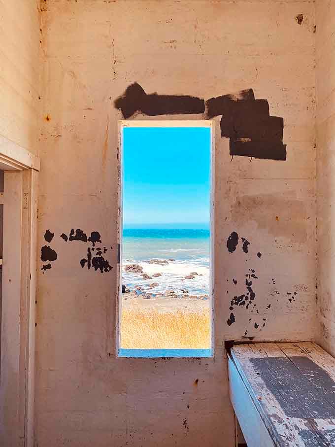 When decay creates accidental art: a doorway framing the ocean like nature's own gallery installation.