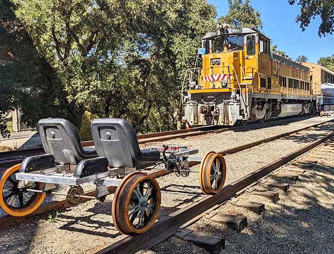 When a bright yellow locomotive photobombs your rail bike, you know you're in the right place.