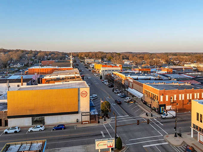 Golden hour transforms downtown Russellville into something Norman Rockwell would've painted, only with better lighting.