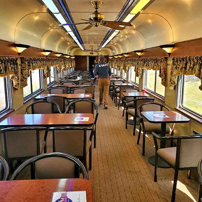 Step inside this dining car where meals are served at tables with actual elbow room and windows worth looking through.