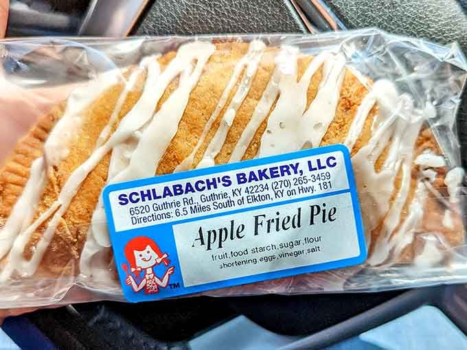 That golden crust and sweet icing drizzle make this apple fried pie look like edible sunshine.
