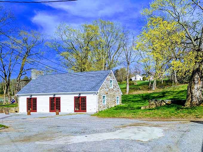 This charming building with red-trimmed windows proves that simple architecture can steal your heart completely.
