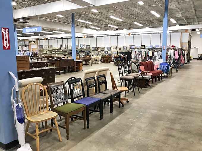 Rows of chairs line up like they're auditioning for your dining room, each one with stories to tell from their previous lives.