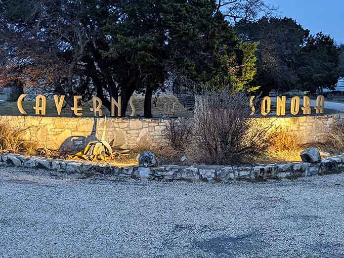 The Caverns of Sonora sign welcomes you to underground wonders that'll make your jaw drop faster than temperatures.