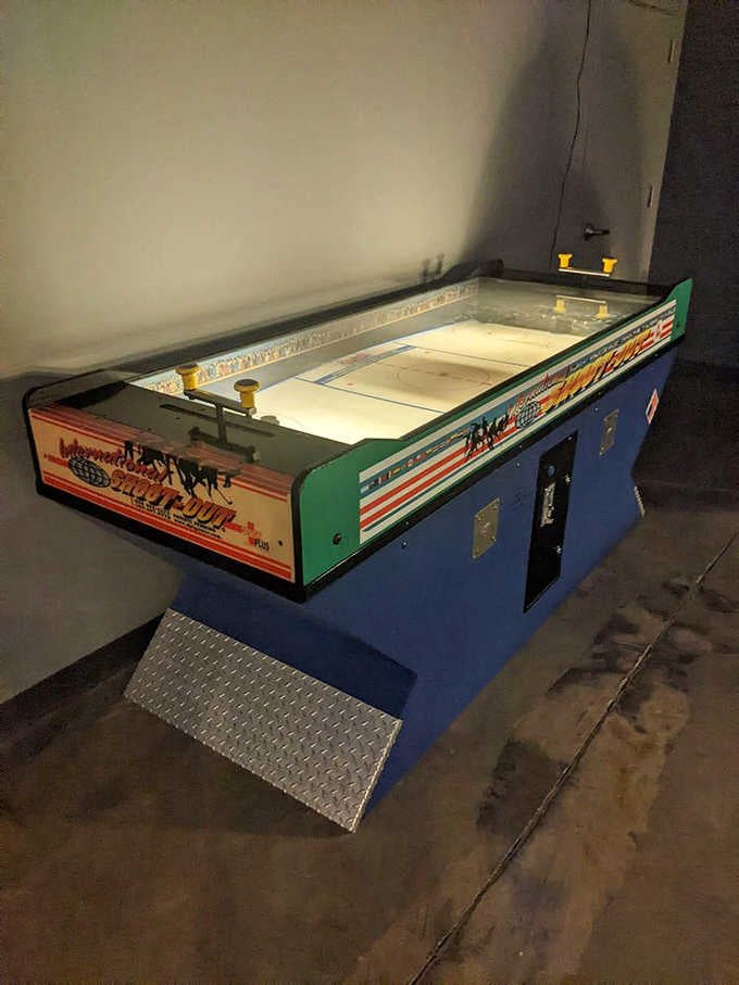 Shuffleboard meets modern arcade vibes in this surprisingly stylish space where generations can actually play together.