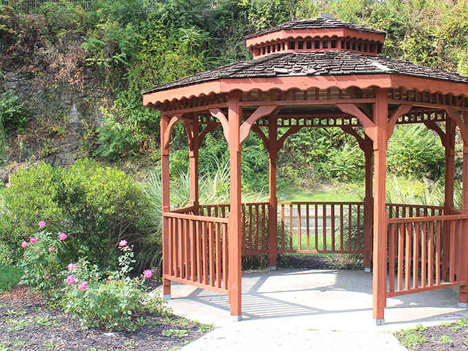 This gazebo has seen more romantic moments than every Hallmark movie combined, and it's not even trying.