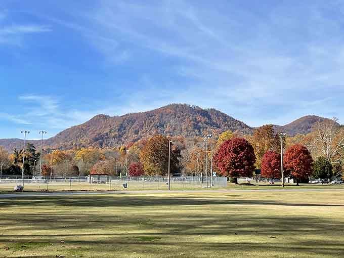 Harmon Field spreads out beneath autumn mountains like nature's own retirement brochure come to life.