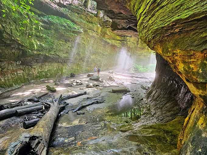 Standing beneath these golden overhangs feels like discovering Indiana's secret answer to slot canyons out West.