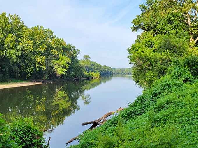 The Schuylkill River reflects the surrounding trees like nature's own mirror, peaceful and timeless as ever.