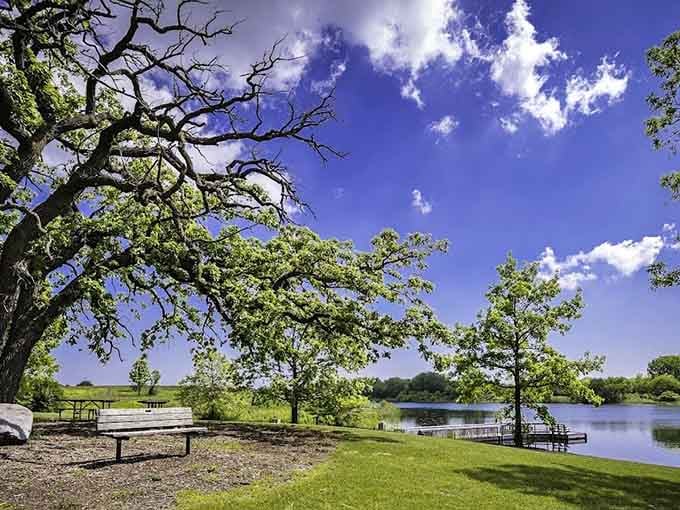 Manicured lawns meet wild shoreline in a landscape that looks almost too perfect to be real.