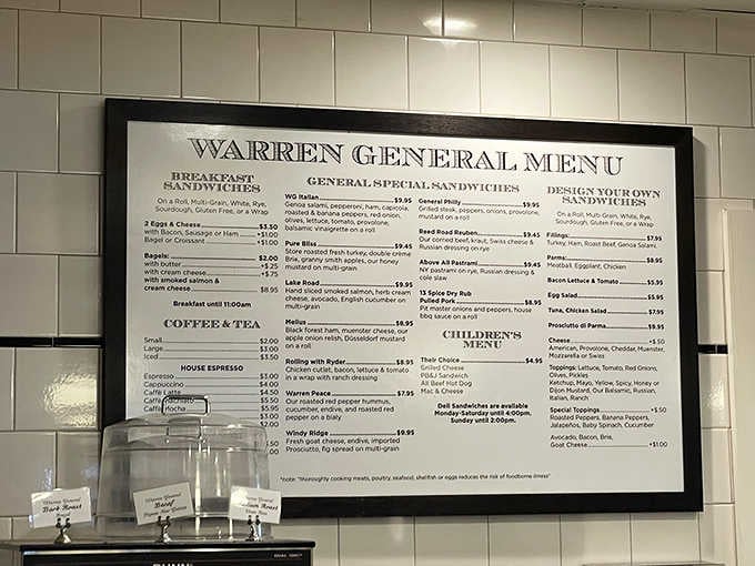 The menu board tells the whole delicious story: breakfast, lunch, custom creations, and endless possibilities for your appetite.