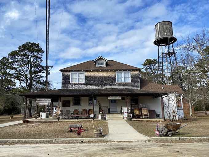 The iconic general store and water tower stand as timeless reminders of Whitesbog's hardworking agricultural past.