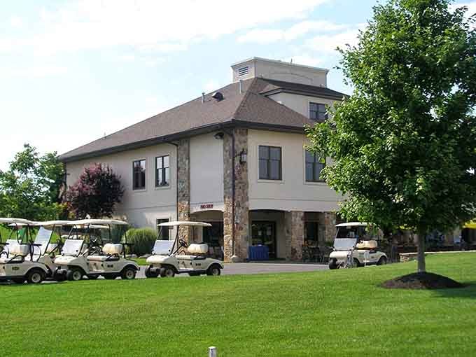 Golf carts lined up like they're planning a very slow parade at Town & Country Golf Links.