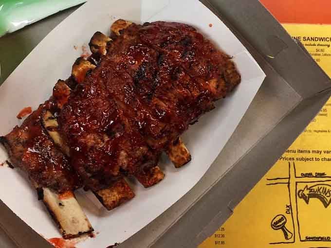 These ribs have that fall-off-the-bone tenderness that makes you question whether bones were ever really necessary in the first place.