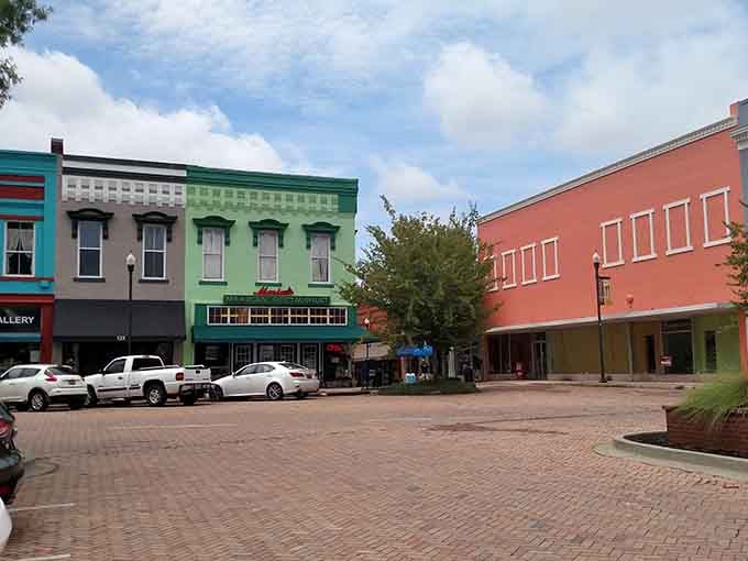 Painted buildings in cheerful colors line brick-paved streets that practically beg you to slow down and explore every corner.