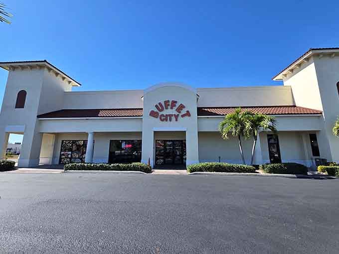 That clean white exterior with palm trees says "Florida buffet paradise" louder than any billboard ever could.
