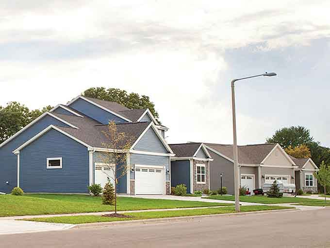 Fresh suburban homes with manicured lawns show Cottage Grove's commitment to comfortable, modern living done right.