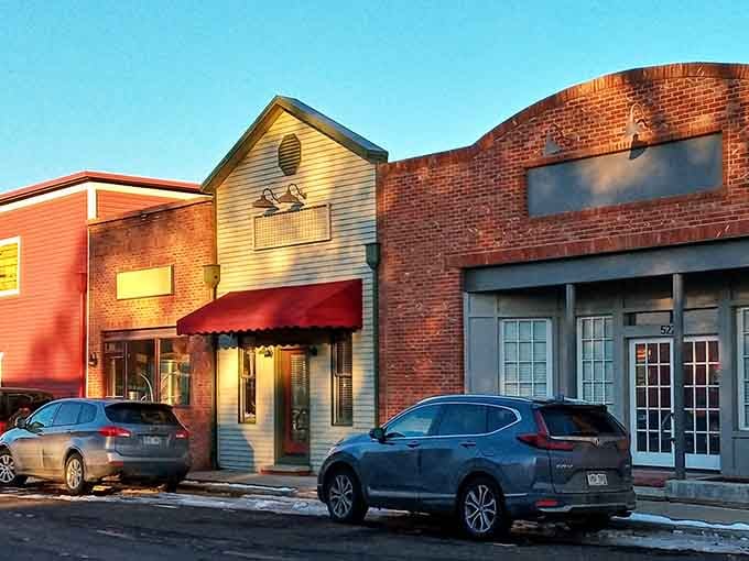 Golden hour kisses these prairie storefronts with warmth that makes even a Tuesday afternoon feel like Saturday morning.