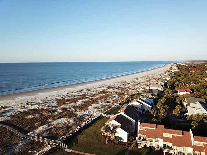 Miles of untouched shoreline stretch endlessly, proving that paradise doesn't need a crowd to be perfect.