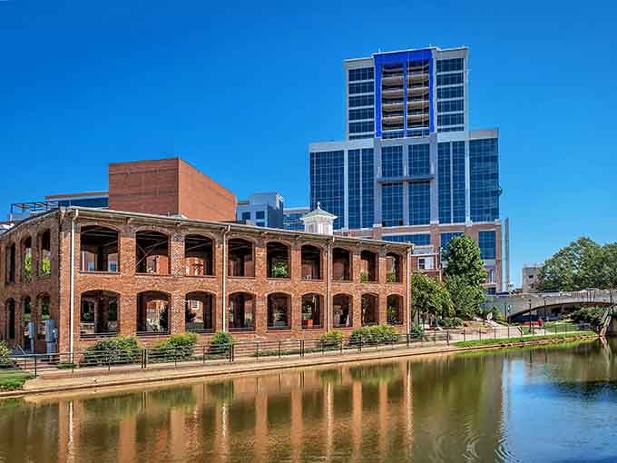 Where historic brick meets modern glass, this waterfall park proves cities can have natural beauty too.