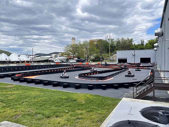 Outdoor karting under dramatic skies brings that authentic racing feeling you remember from watching Grand Prix races.