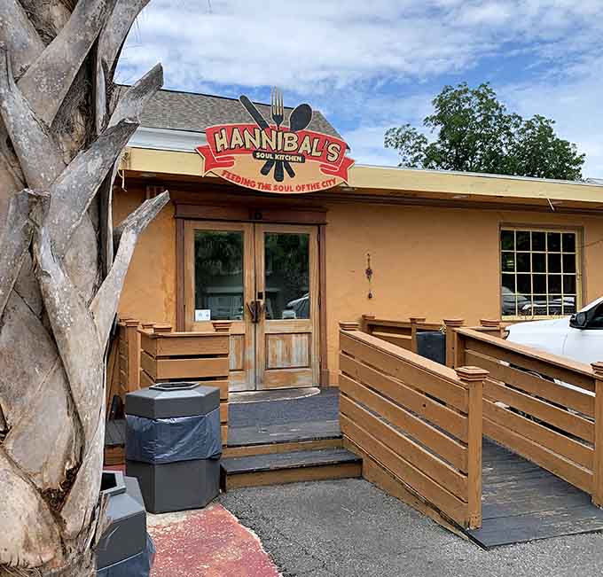 That wooden deck and bold red sign create an inviting front porch vibe where soul food meets Southern hospitality.