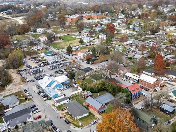 This bird's-eye view shows off charming neighborhoods, colorful rooftops, and beautiful tree-lined streets in stunning fall colors!
