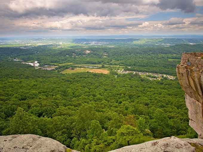 Standing on ancient rock, you can see forever—literally seven states stretch out before your eyes.
