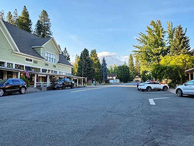 Wide streets framed by towering pines create a mountain village atmosphere that feels wonderfully removed from everything.