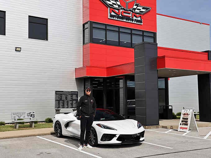 That white Corvette outside isn't just for show; it's a promise of the speed waiting inside for you.