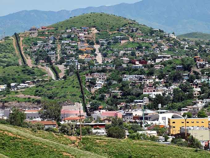 Nogales sprawls across hillsides like a colorful postcard where two countries meet and retirement budgets breathe easier.