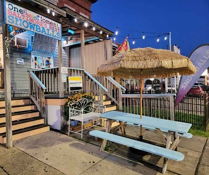 String lights and a tiki umbrella create the perfect summer evening vibe for enjoying Baltimore's finest snowballs.