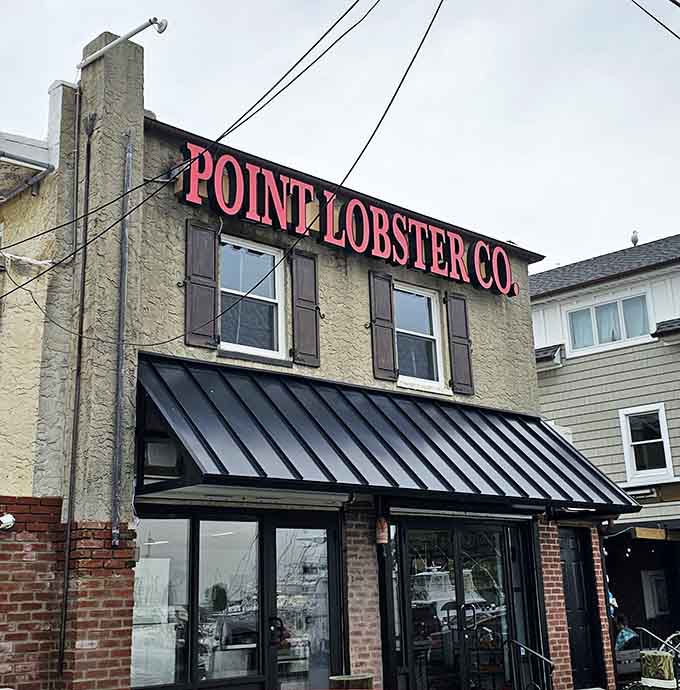 That hot pink sign glows like a beacon calling all lobster lovers to their happy place.