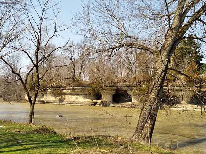 Mysterious cave openings peer from limestone cliffs along the river, like windows into Indiana's ancient past.