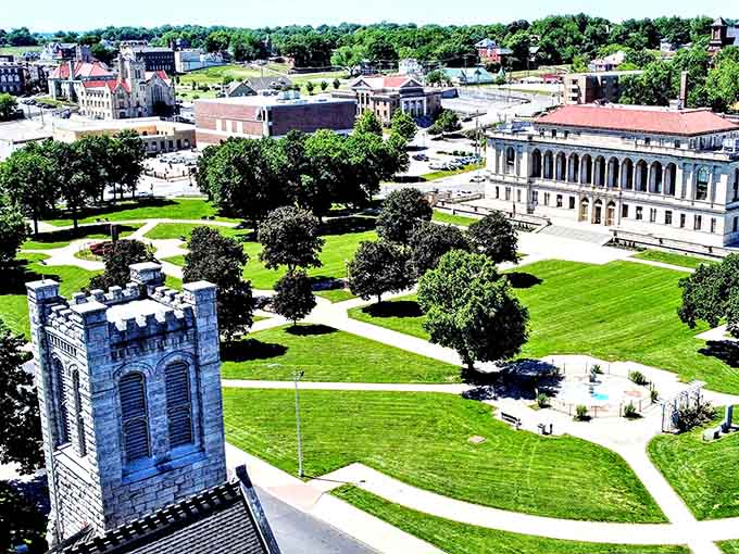 That castle-like water tower stands guard over sprawling green lawns like something from a fairy tale gone Midwest.