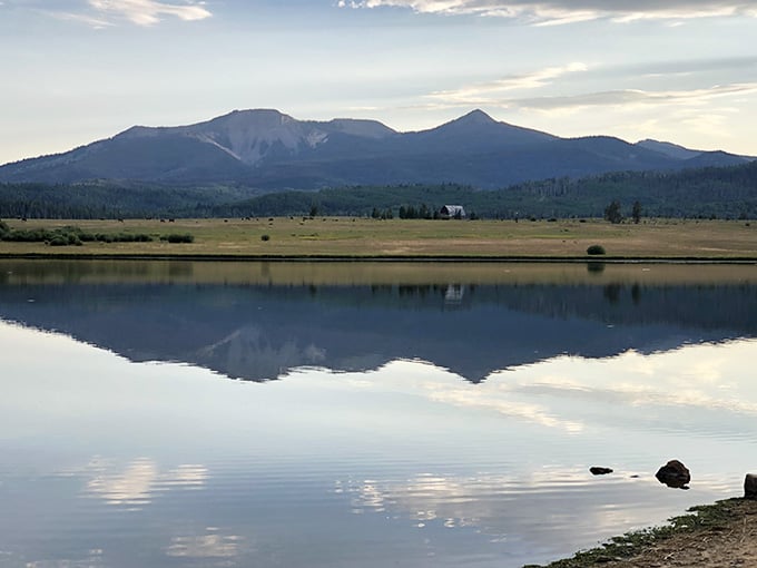 When the morning light hits those peaks reflected in glass-smooth water, you'll forget what state you're in.