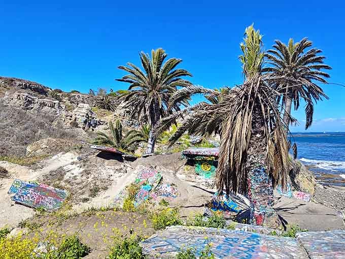 Where urban development met the Pacific and lost, colorful graffiti now decorates the ruins like modern hieroglyphics.