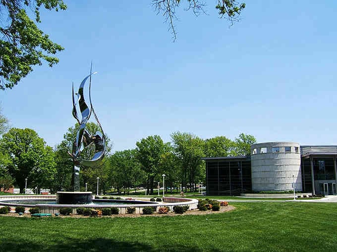 Modern sculpture meets green space in Terre Haute, proving that art and nature make perfect neighbors in any city.