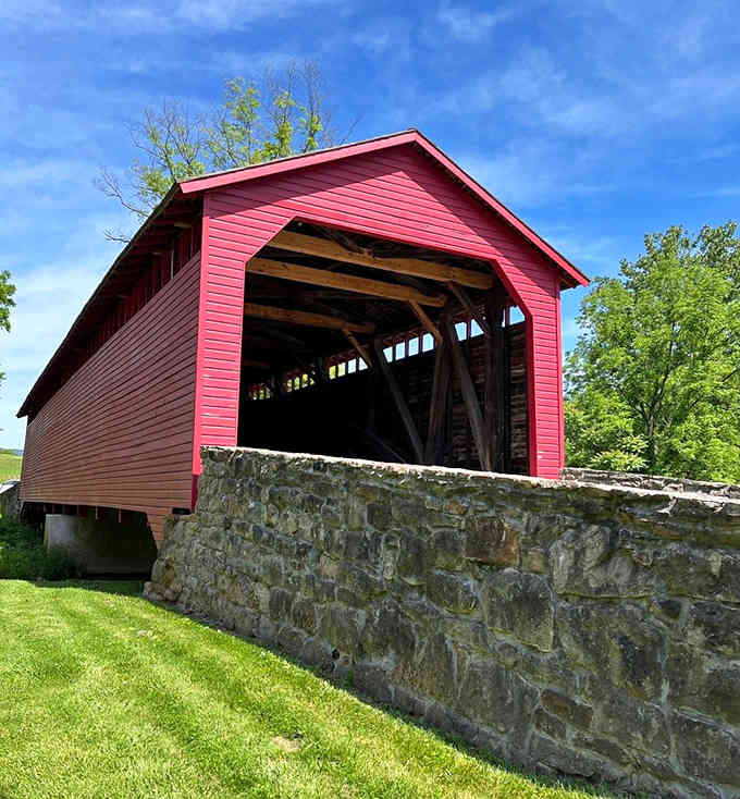 Under summer's bright sky, visitors gather to celebrate this handsome bridge, creating memories that'll last longer than film.