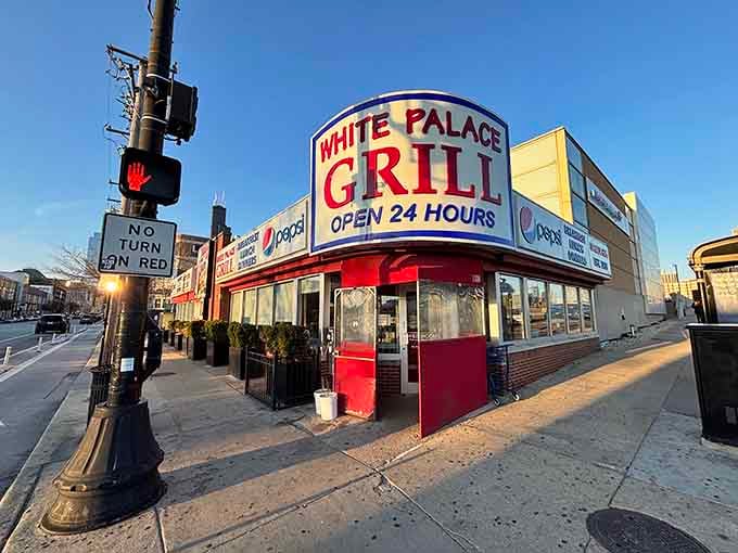 The iconic red and white corner location stands ready to feed you any hour, day or night.