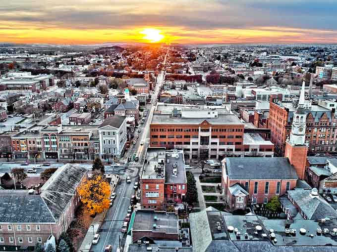 Golden hour paints the rooftops in warm light, revealing a city that's more charming from above than you ever imagined.