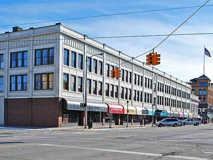 This impressive white building stretches along the street like a grand dame refusing to fade into obscurity.