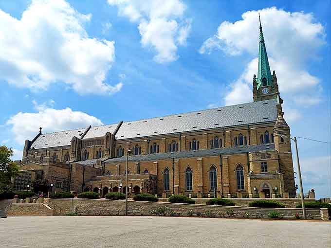 That soaring limestone spire in Belleville reaches toward the clouds like it has somewhere very important to be.