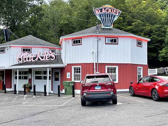 The packed parking lot tells the whole story&mdash;when locals line up like this, you know the charcoal-grilled dogs are legendary.
